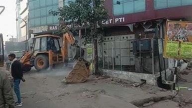 Rajasthan Paper Leak: RPSC पेपर लीक केस के मास्टरमाइंड के कोचिंग पर चला बुलडोजरRajasthan ...