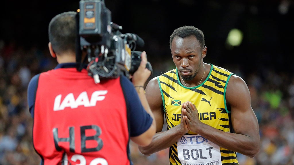 Usain Bolt Carrying a Hamstring Injury