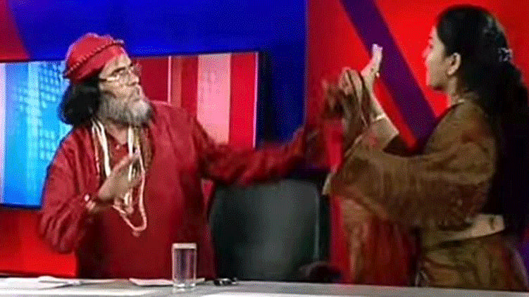 TV Debate Hits New Low: Lady Astrologer & Baba Trade Slaps ON AIR