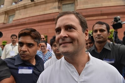 Rahul hugs unwilling Modi, winks; Speaker annoyed
