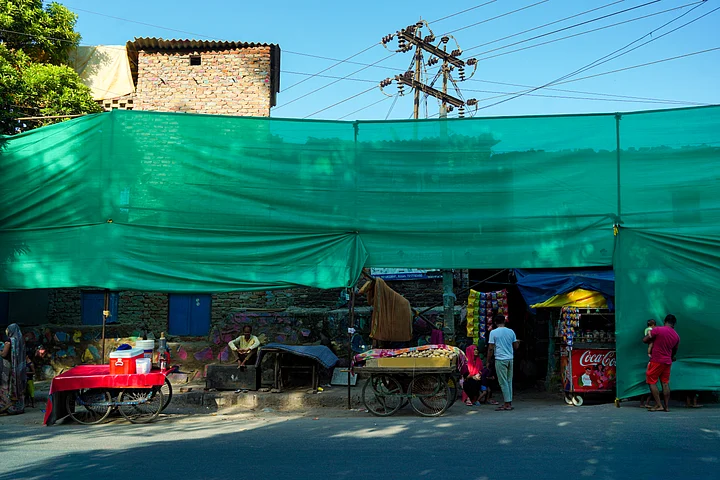 In Photos | 'Ashamed of Poverty': Green Sheets Mask Delhi Slums Ahead ...