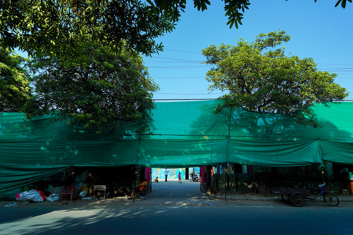 In Photos | 'Ashamed of Poverty': Green Sheets Mask Delhi Slums Ahead ...